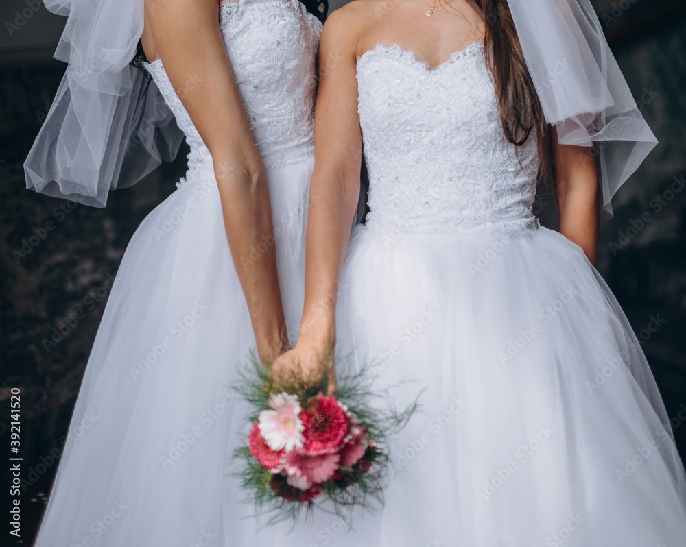Newlywed Lesbian Couple On Their Happy Wedding Day Wearing White