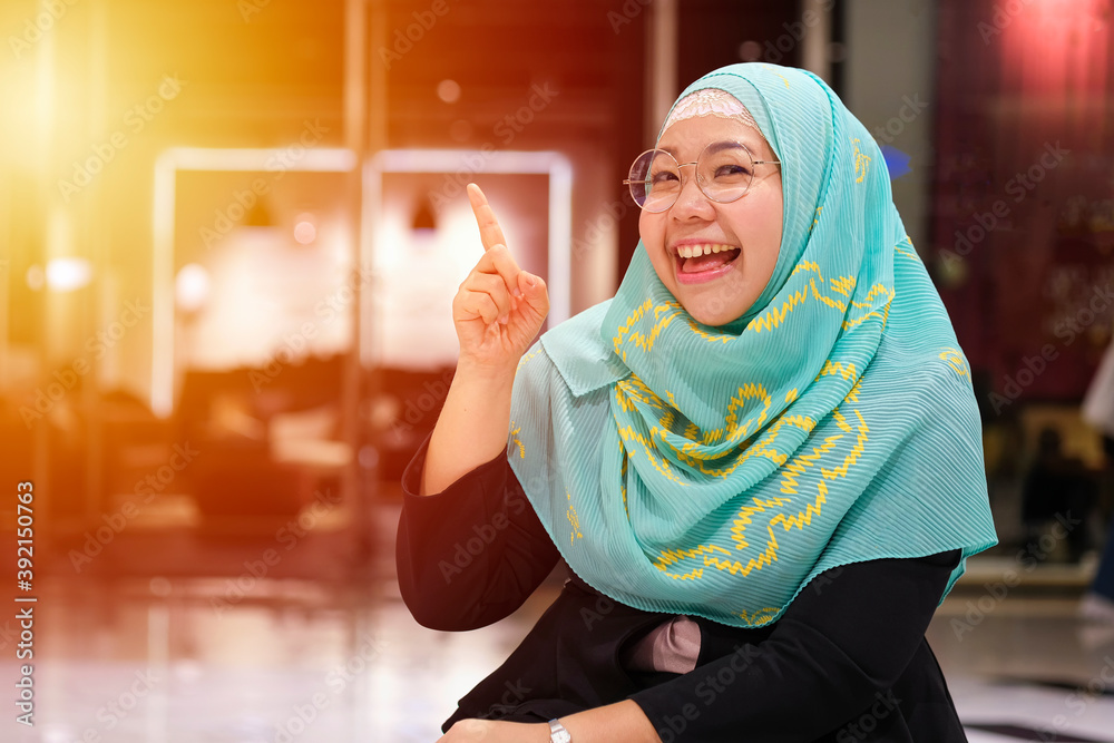 Beautiful Muslim Business woman with green hijab, Young overweight ...