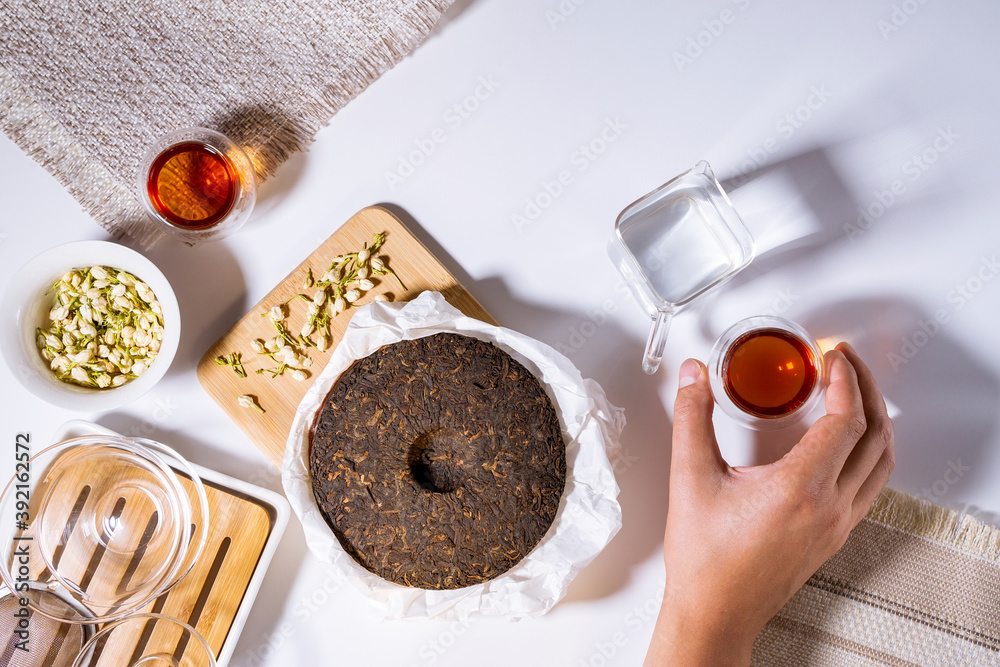 pressed Chinese Shu pu-erh tea. tea ceremony top view, flat lay ...