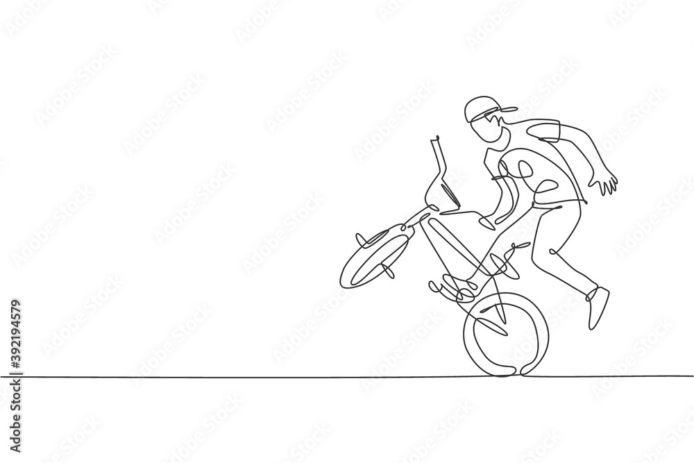 One single line drawing of young bmx bicycle rider performing freestyle ...