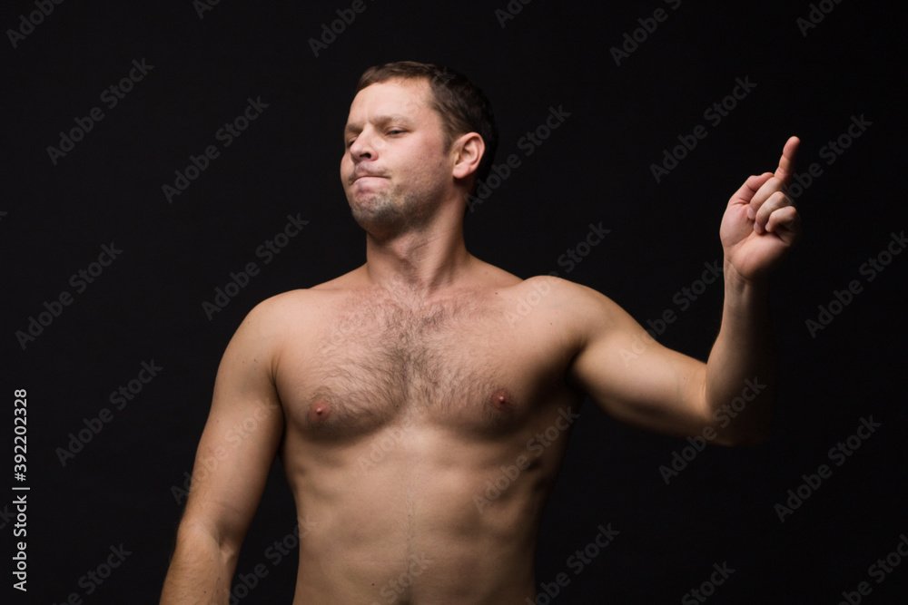 Handsome man in underwear on the black background. Muscular and ...