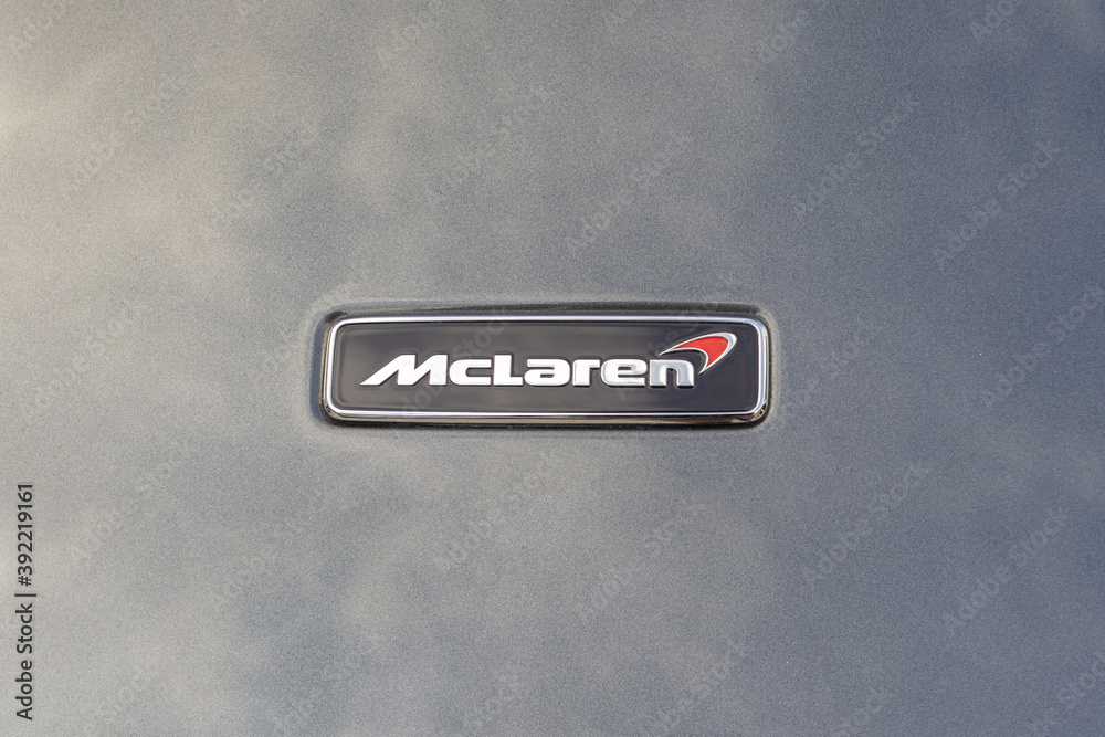 Real McLaren logo on the real gray metallic car body Stock Photo ...