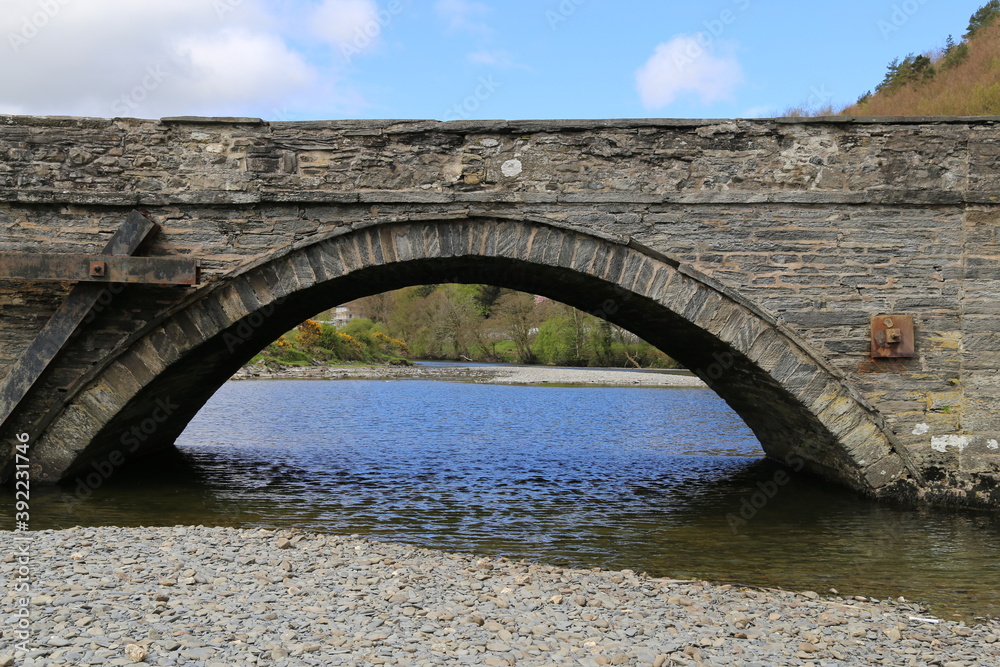 The picturesque Dyfi bridge which is the main entry to Machynlleth ...