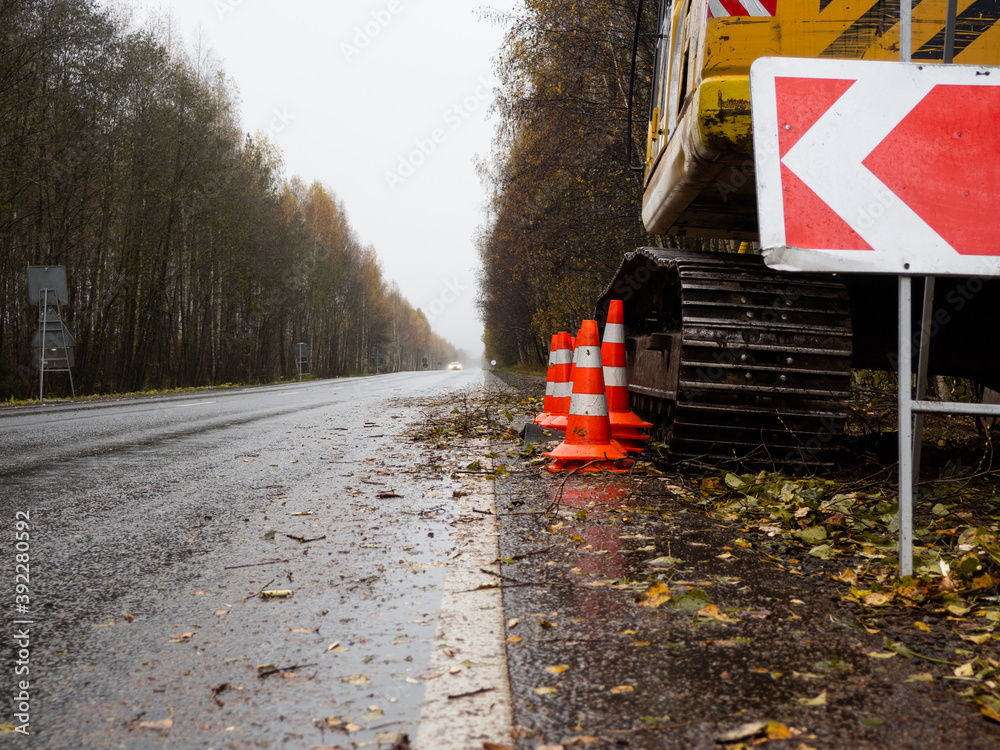 detour sign on the right. special equipment on the side of the road ...