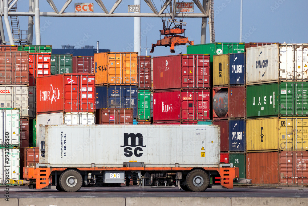 Automated Guided Vehicles moving shipping containers in the port ...