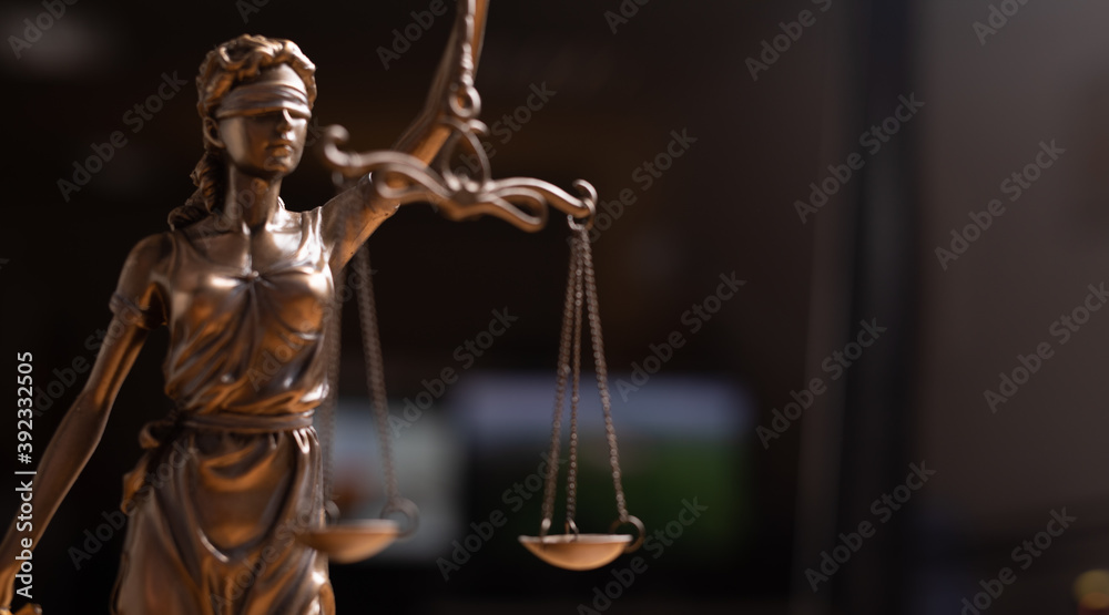 Statue of lady justice on bright background - Side view with copy space ...