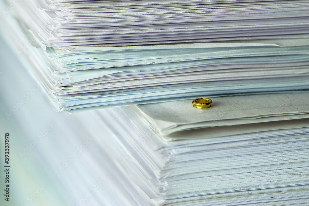 bundles bales of paper documents. stacks packs pile on the desk in the ...