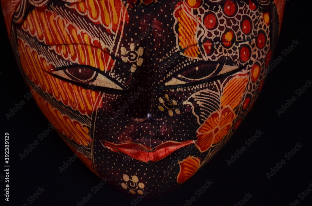 masks made of wood with a special pattern typical of Indonesian culture ...