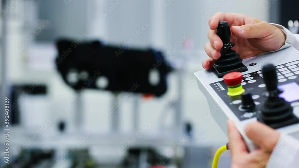 Professional quality engineer measuring on the 3D measurement machine ...