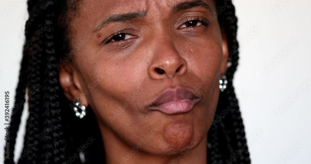 African woman grimacing making funny faces to camera. Expressive fun ...