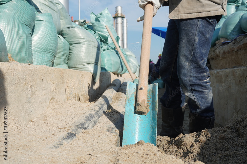 Digging spade polyvinyl chloride (PVC) used to dig the ground near the ...