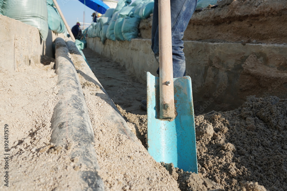 Digging spade polyvinyl chloride (PVC) used to dig the ground near the ...