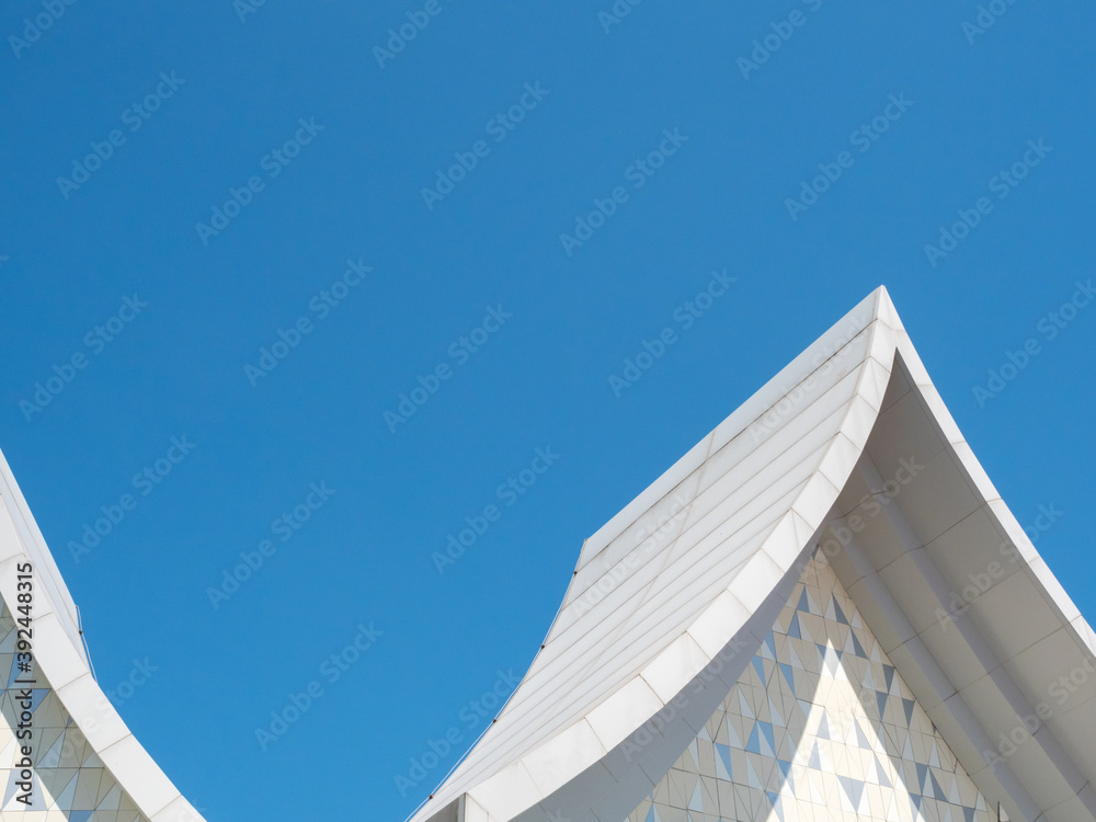 White Thai style roof design in a more modern and minimal style with ...