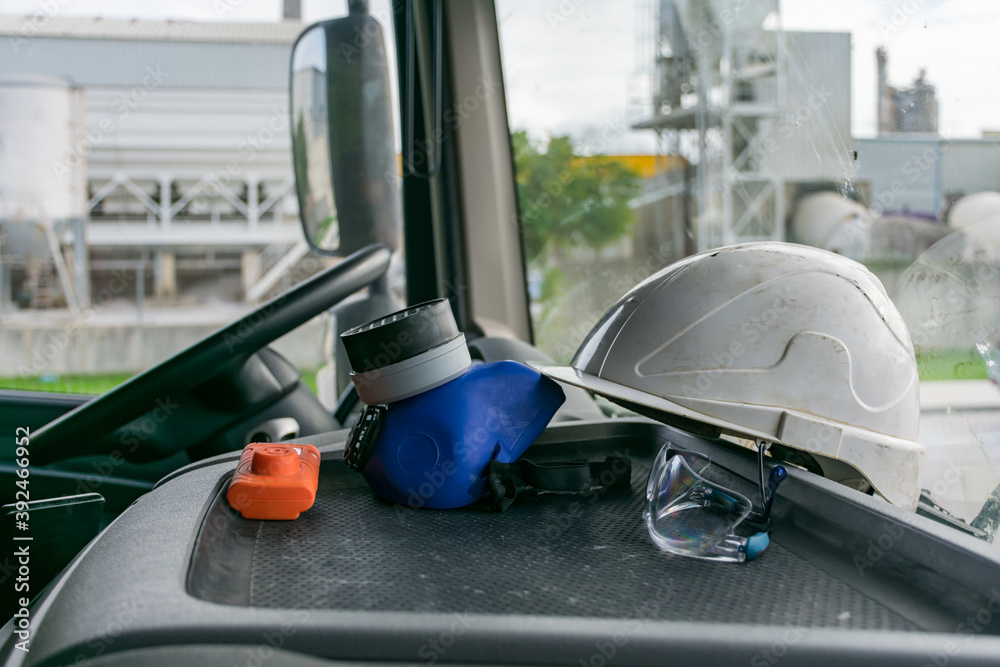Personal protective equipment in the cabin of a truck that transports ...