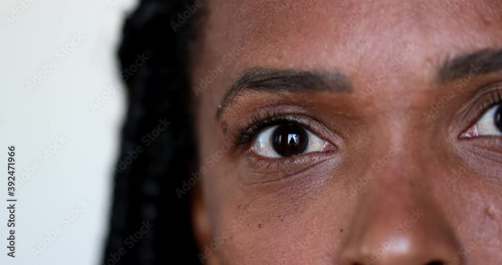 Disturbed Black African woman opening eyes reacting with HORROR AND ...
