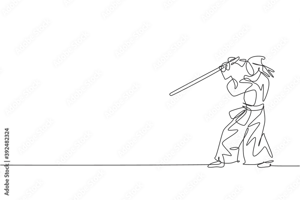 One single line drawing young energetic man exercise defense kendo move ...