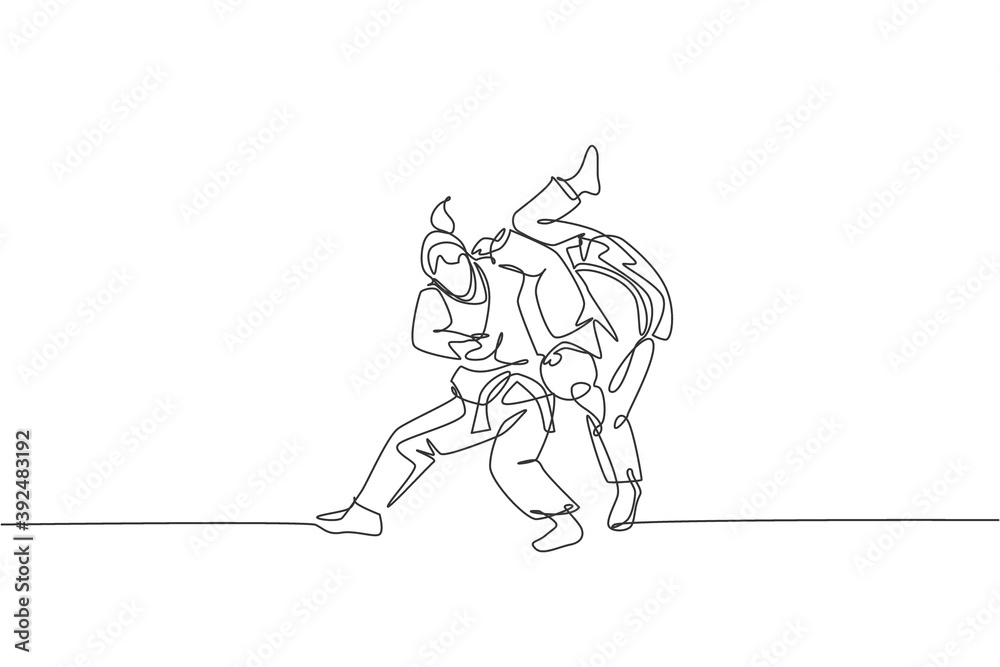 One continuous line drawing two young sporty women training judo ...