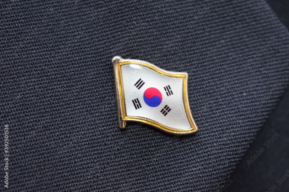 South Korea flag lapel pin on a suit Stock Photo | Adobe Stock