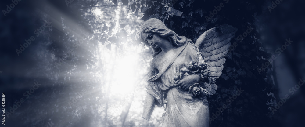 Sad Angel of death.. Ancient statue. Horizontal image. Stock Photo ...