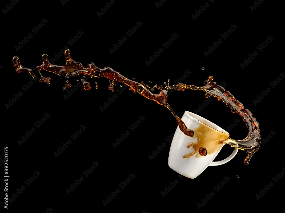Flying coffee cup splash on black background Stock Photo | Adobe Stock