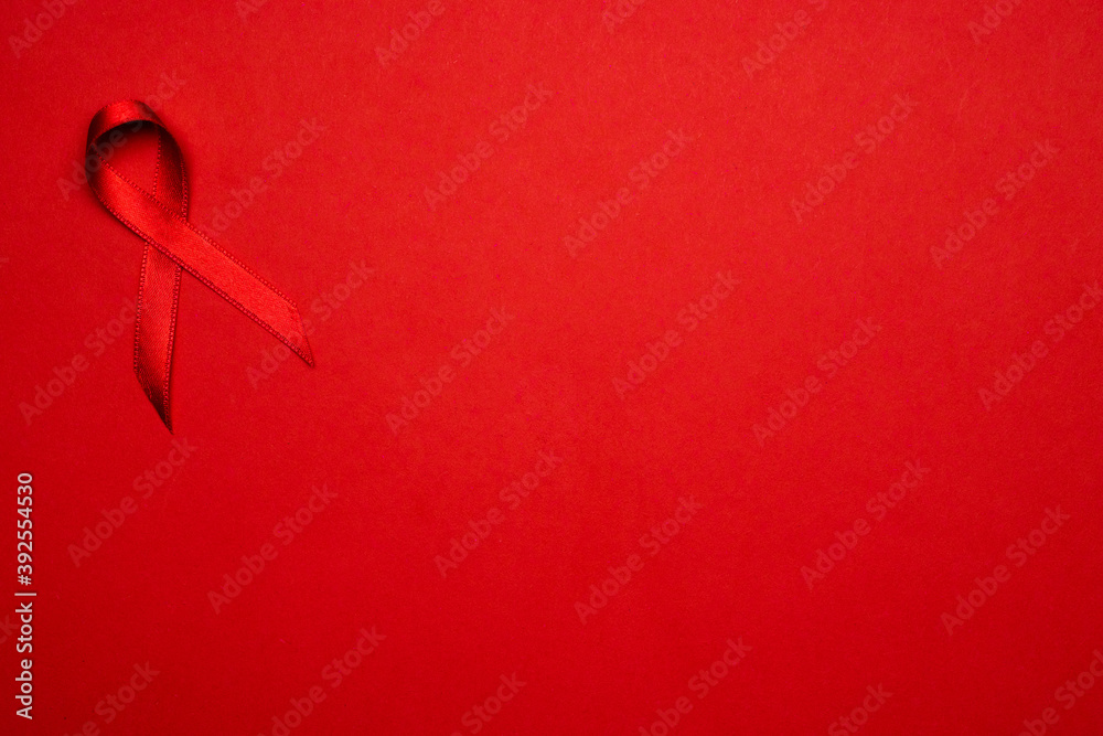 Aid ribbon silk. Red ribbon symbol in hiv world day on dark red ...