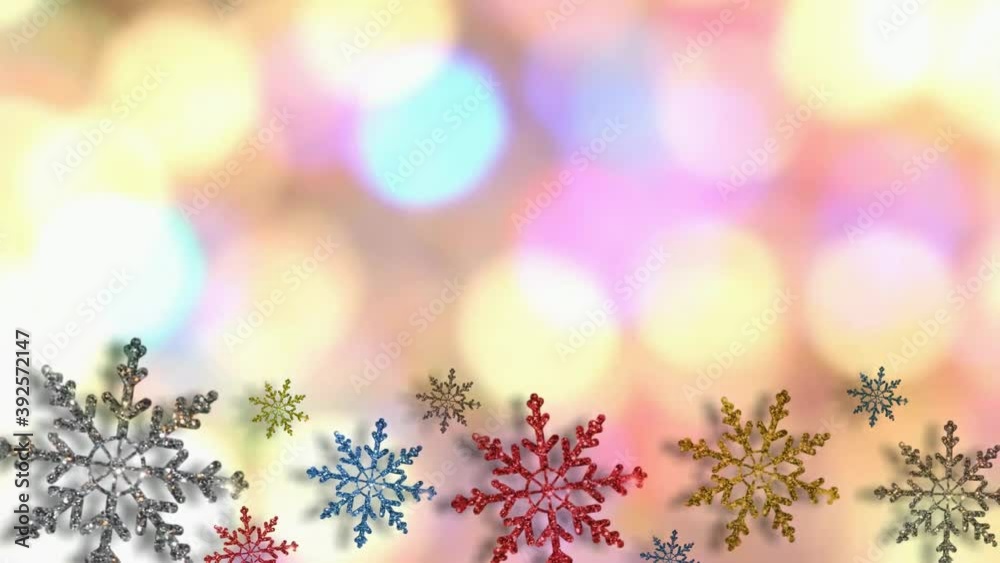 beautiful Christmas video with colorful snowflakes on a light ...