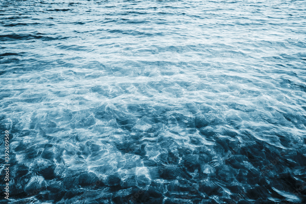 Sea wave background. Calm waves on shallow water. Ripples on lake water ...