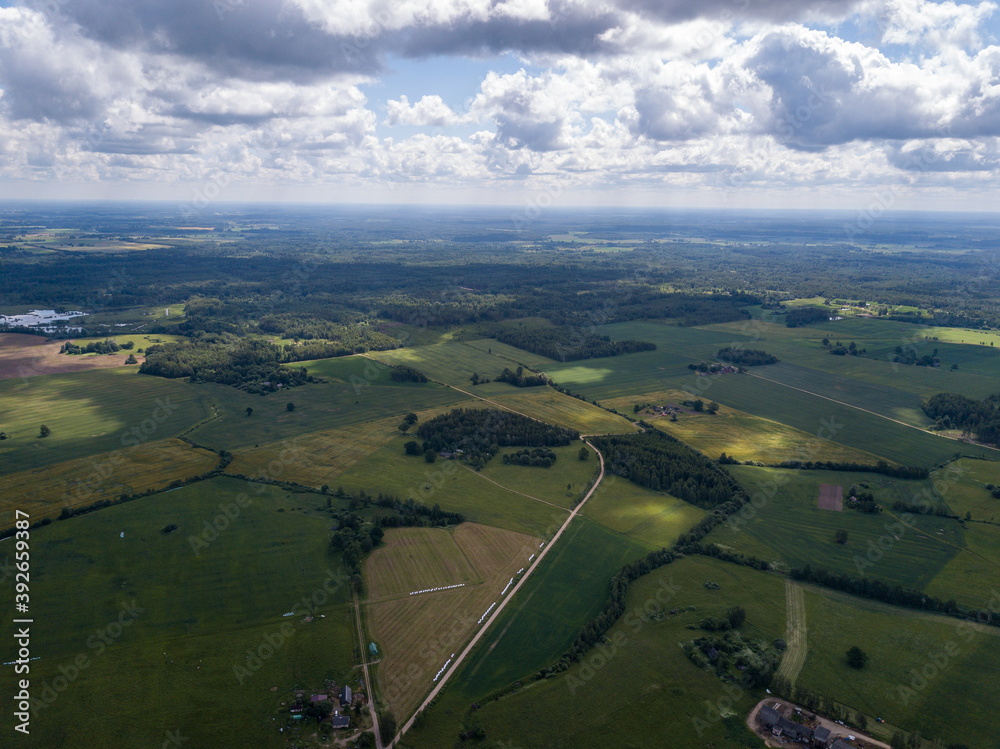 countryside aerial landscape with roads and green fields in summer ...