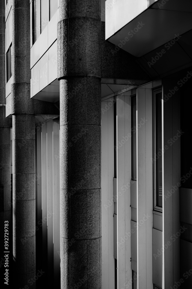 Black and white monochrome image of facade of 1980s office building ...
