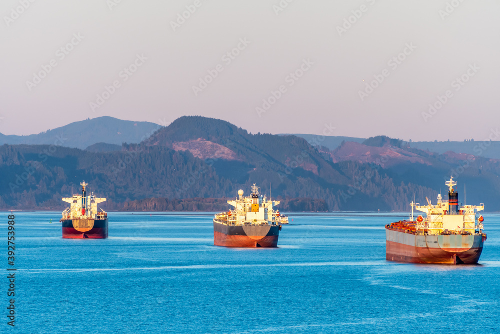 Fleet of cargo ships sailing ocean. Container nautical vessels with ...