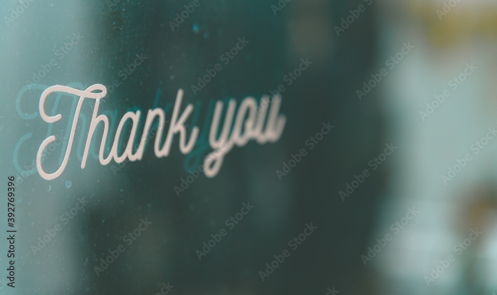 Words thank you on window glass with copy space. Thank you concept ...