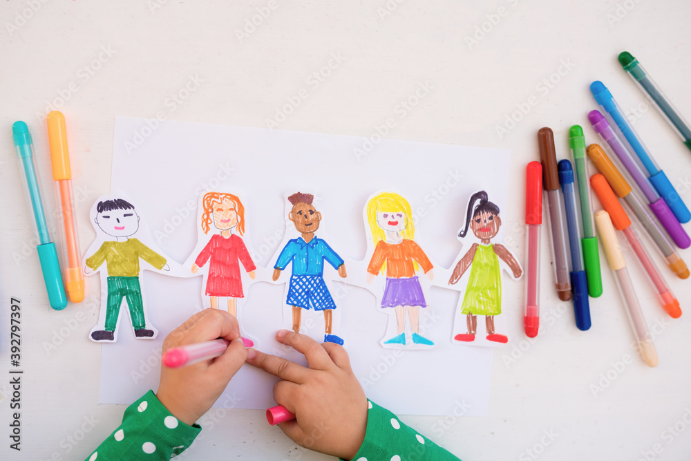 Closeup child girl drawing with colored markers pens international ...