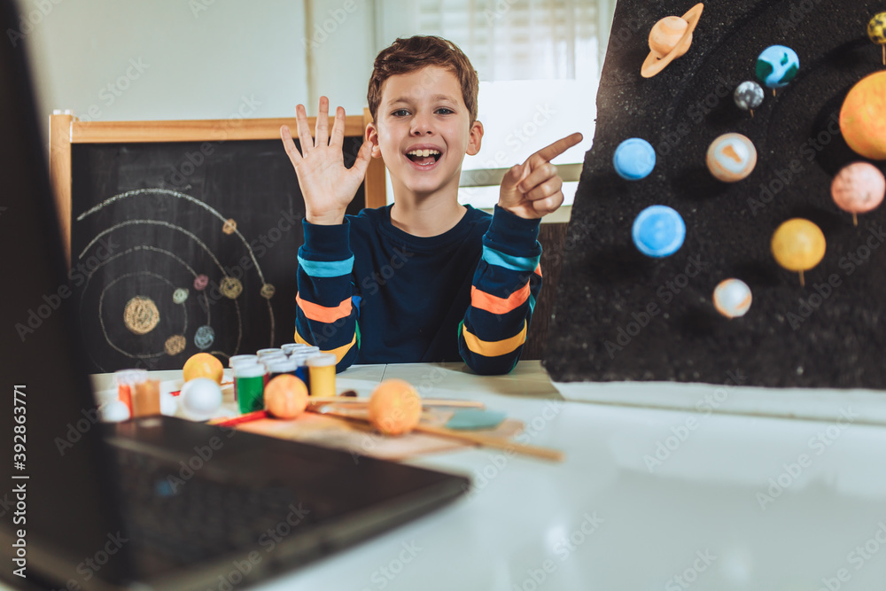 Kid presenting their science home project - the planets of our solar ...