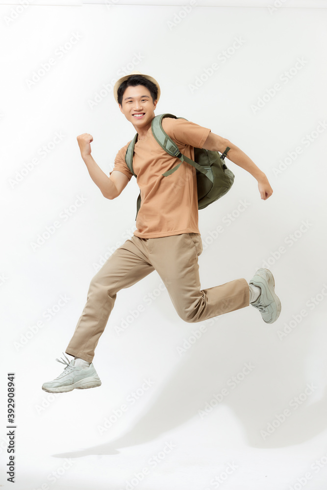 travel, tourism and people concept - happy smiling young man with ...