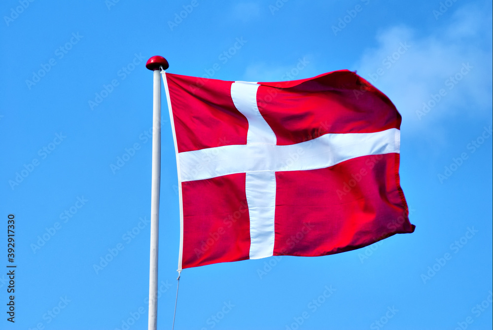Dannebrog - The ensign flag of the kingdom of Denmark Stock Photo ...