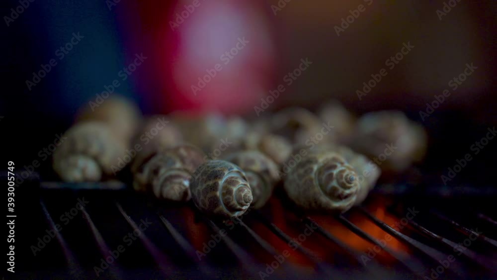 Fresh Sea shell grill with fire and smoke. Concept seafood bar and ...