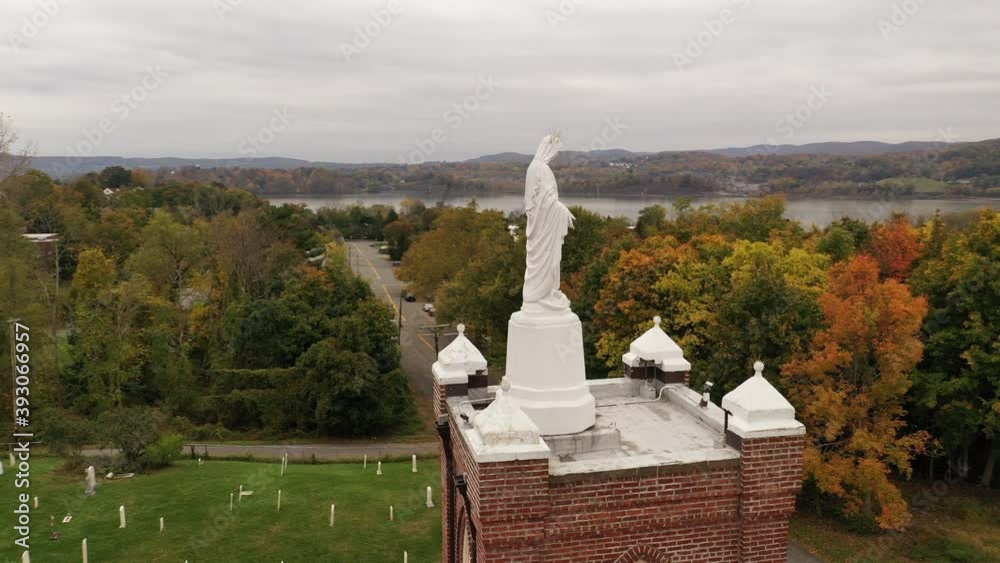An aerial view of a statue of the Virgin Mary on top of a Catholic ...