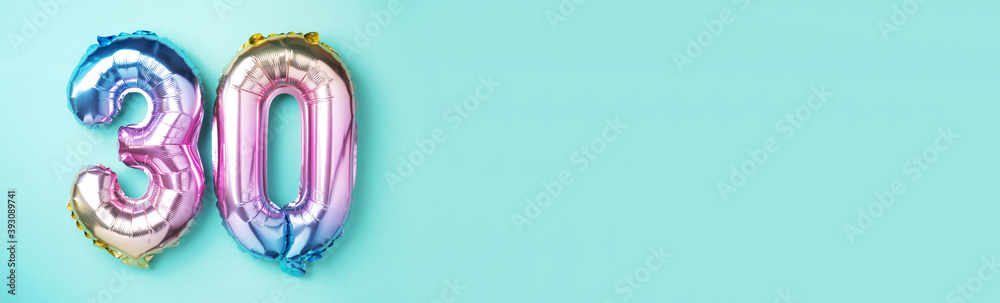 Rainbow foil balloon number, digit thirty. Birthday greeting card with ...