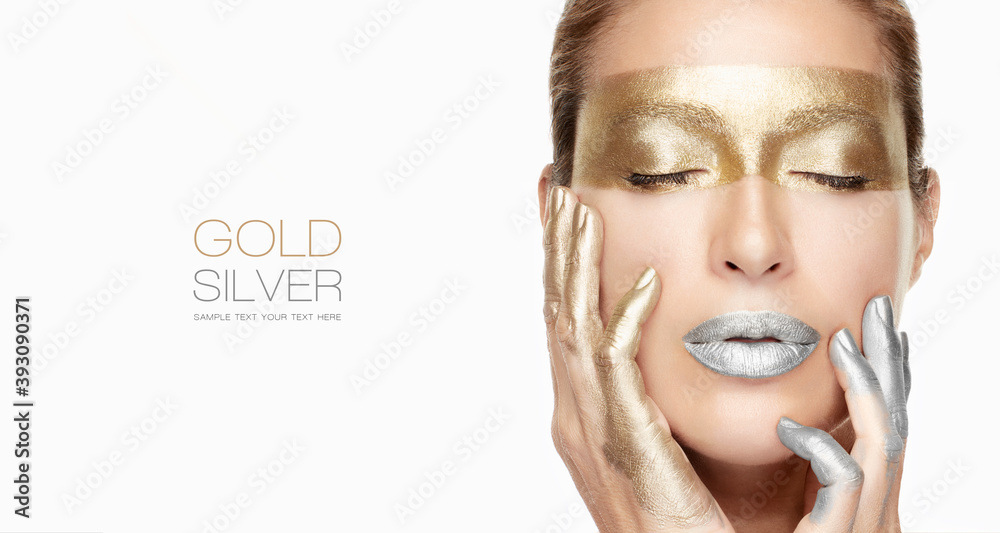 Beauty and makeup concept. Beautiful model girl with gold and silver ...