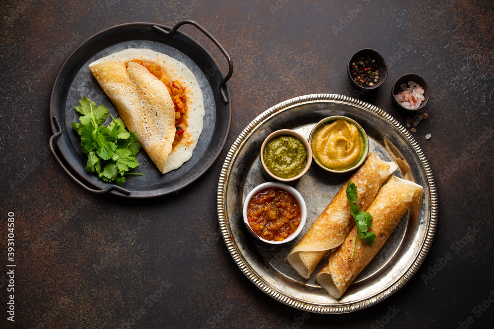 Foto Stock Different types of traditional Indian rice pancakes Dosa ...