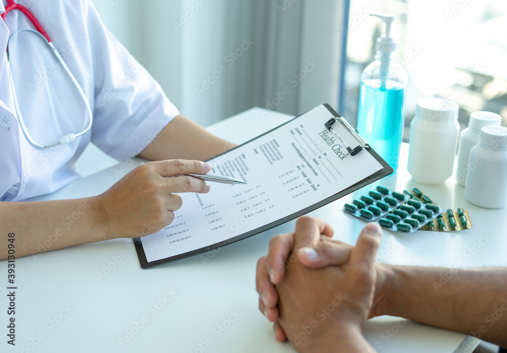 The doctor is examining the patients according to the checklist, annual ...