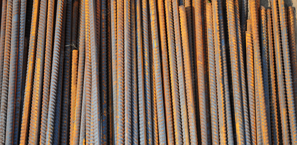 A close-up of reinforcing steel bars, rebars used to strengthen the ...