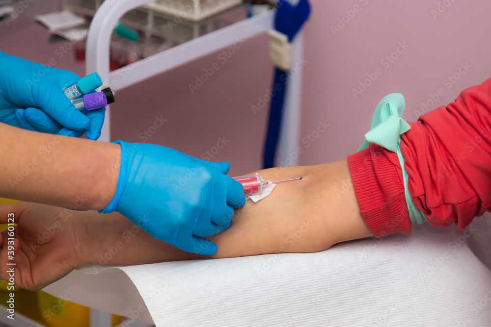 The process of taking venous blood for analysis in the clinic. Doctors ...