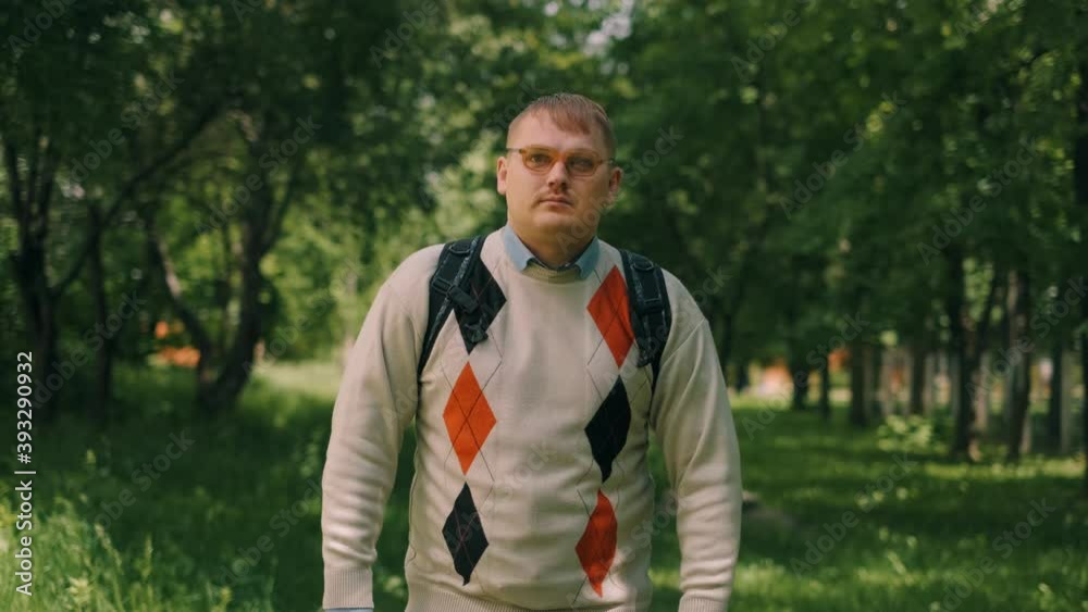 Nerdy fat guy is walking to school. Concept of loser nerd at university ...