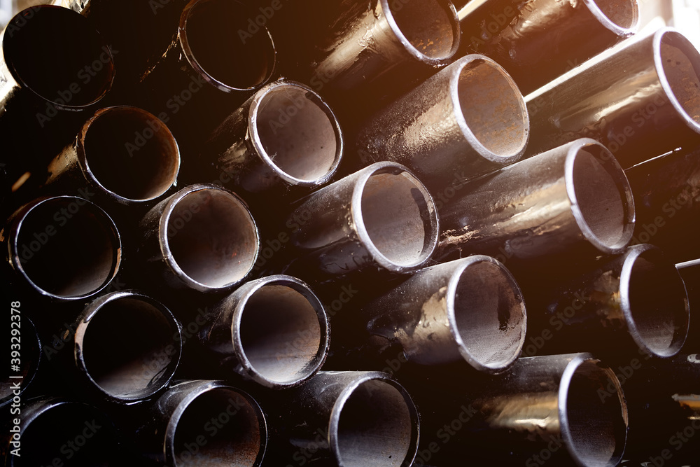 Black metal pipes and adapters of different diameters for gasification ...