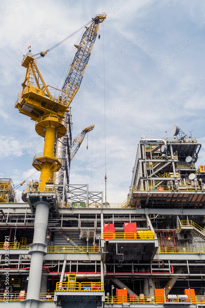 A typical offshore pedestal crane on an oil production platform Stock ...