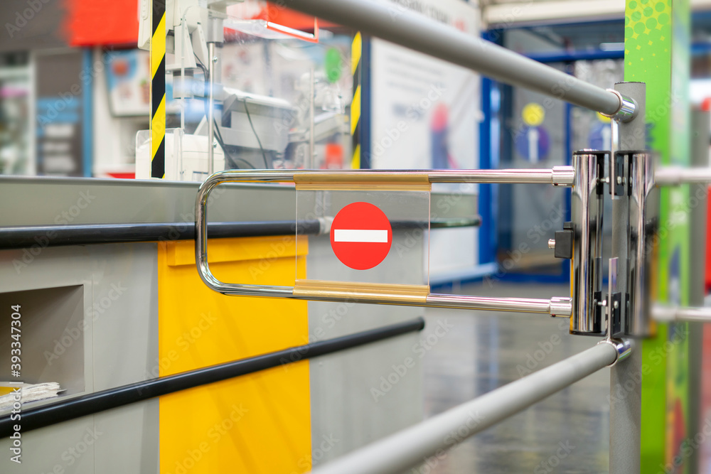 closed barrier, stop sign in the food grocery store supermarket ...