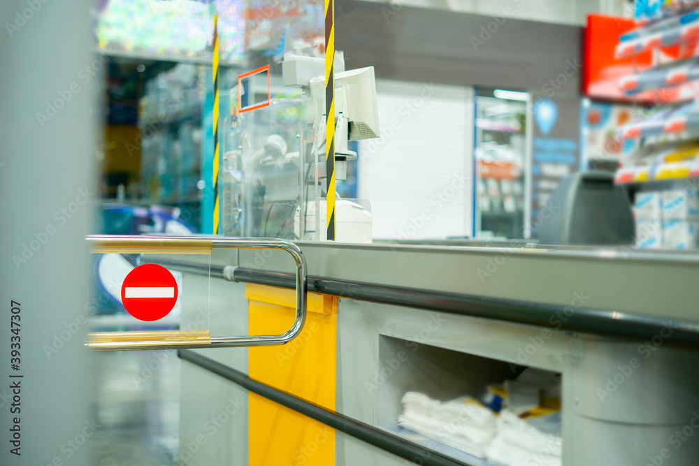 closed barrier, stop sign in the food grocery store supermarket ...