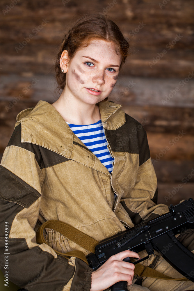 Young girl in Soviet military uniform Stock Photo | Adobe Stock