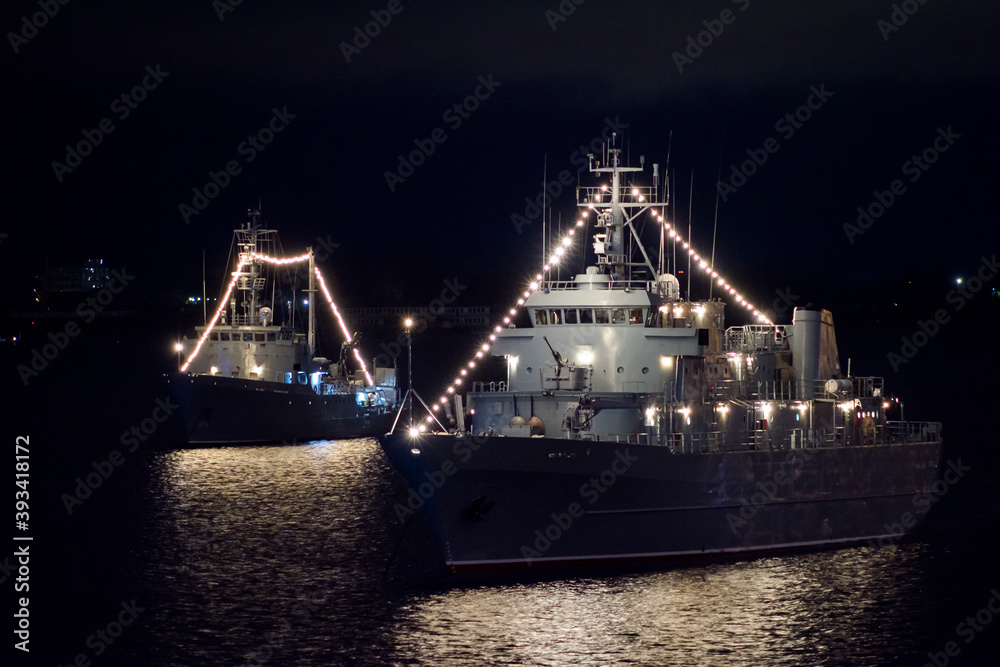 Navy ships with the celebration lights on Stock Photo | Adobe Stock